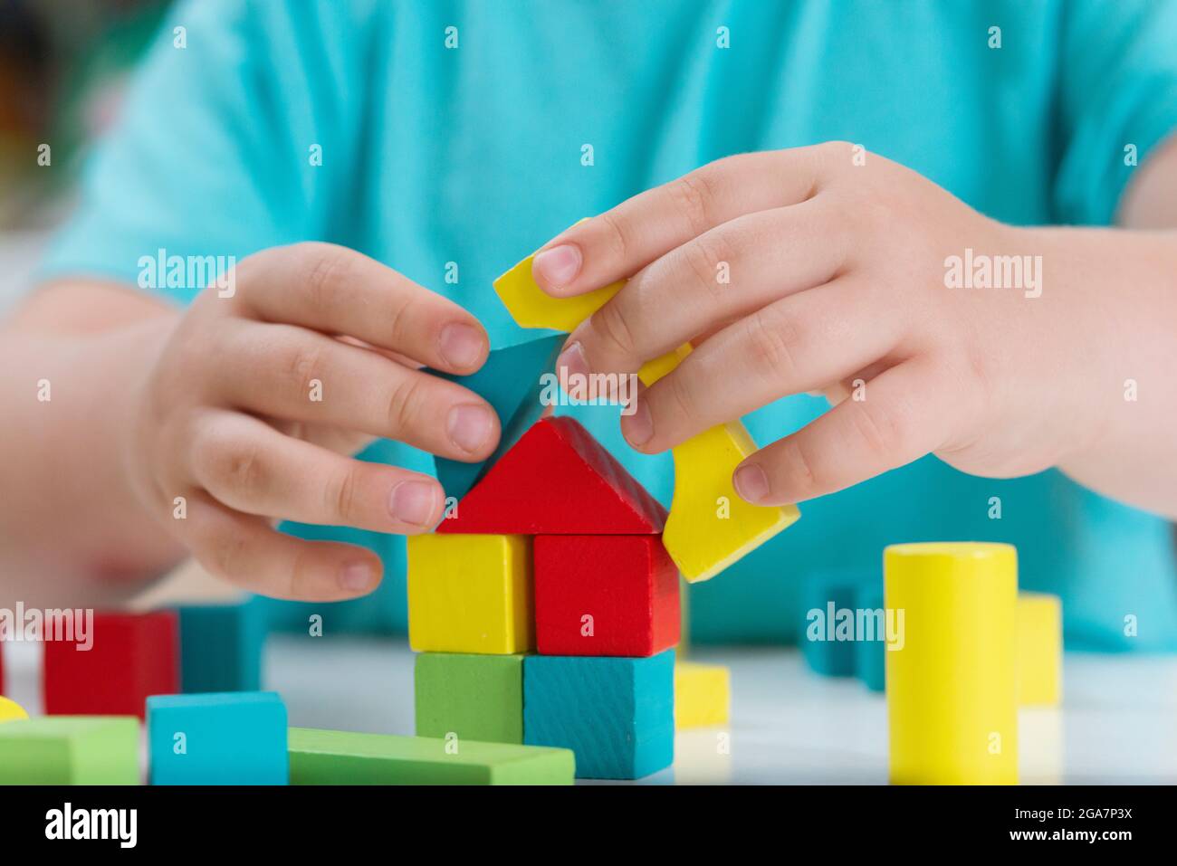Boy Playing Building Wooden Blocks Stock Photo - Alamy