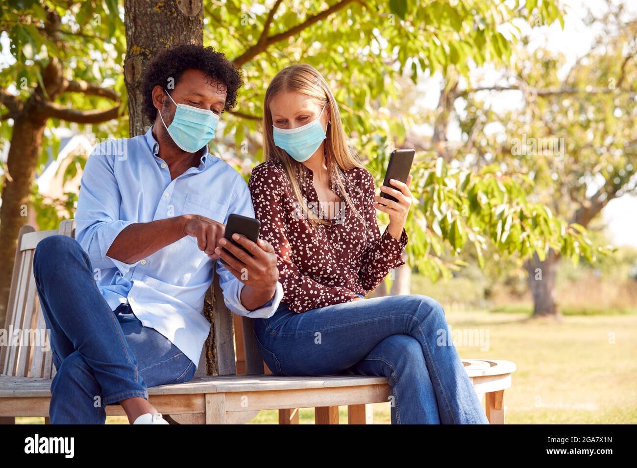 Socializing outdoors mask hi-res stock photography and images - Alamy