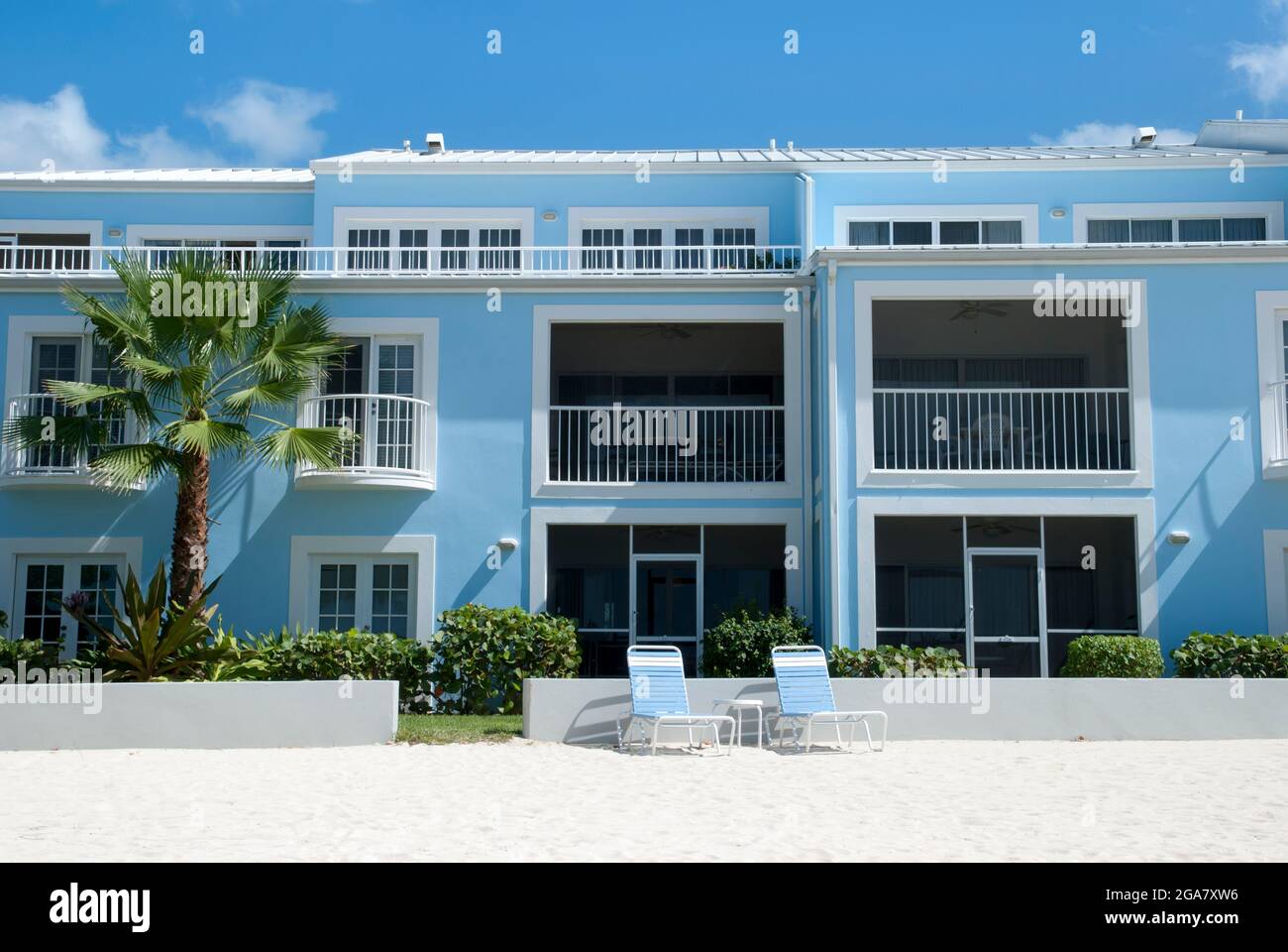 The blue color building and chairs on Grand Cayman island Seven Mile ...