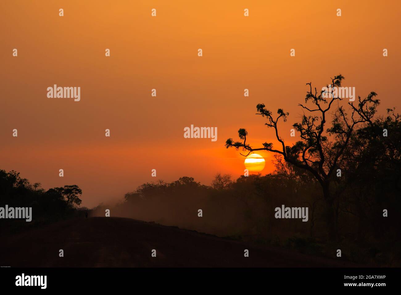 Colorful sky at sunset in rural area of Ghana, West Africa Stock Photo ...