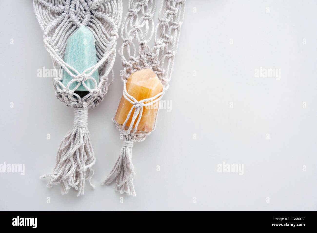 Pendants hippie macrame with gemstones as spiritual talismans on a ...