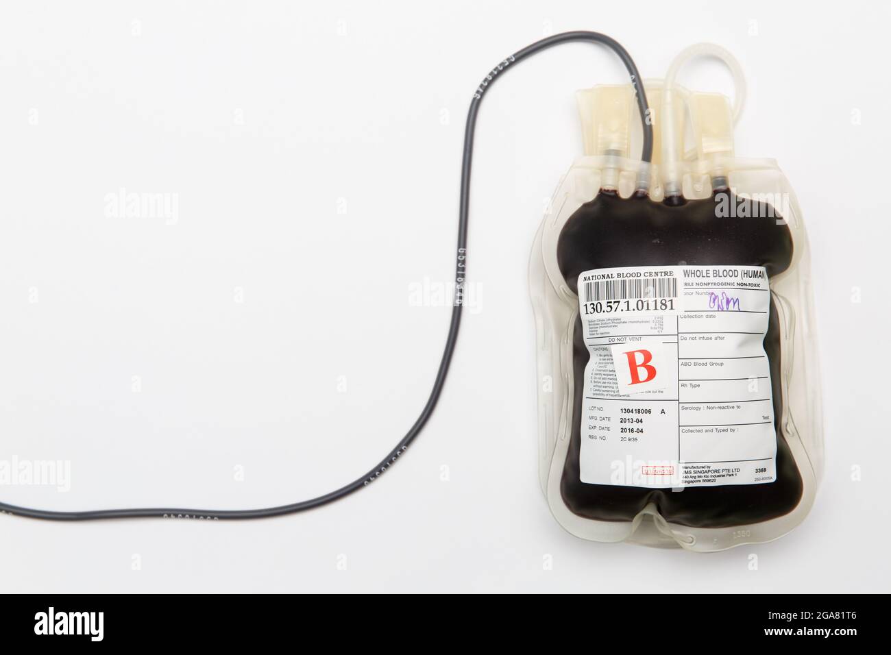 Blood bag with tube on white background Stock Photo - Alamy