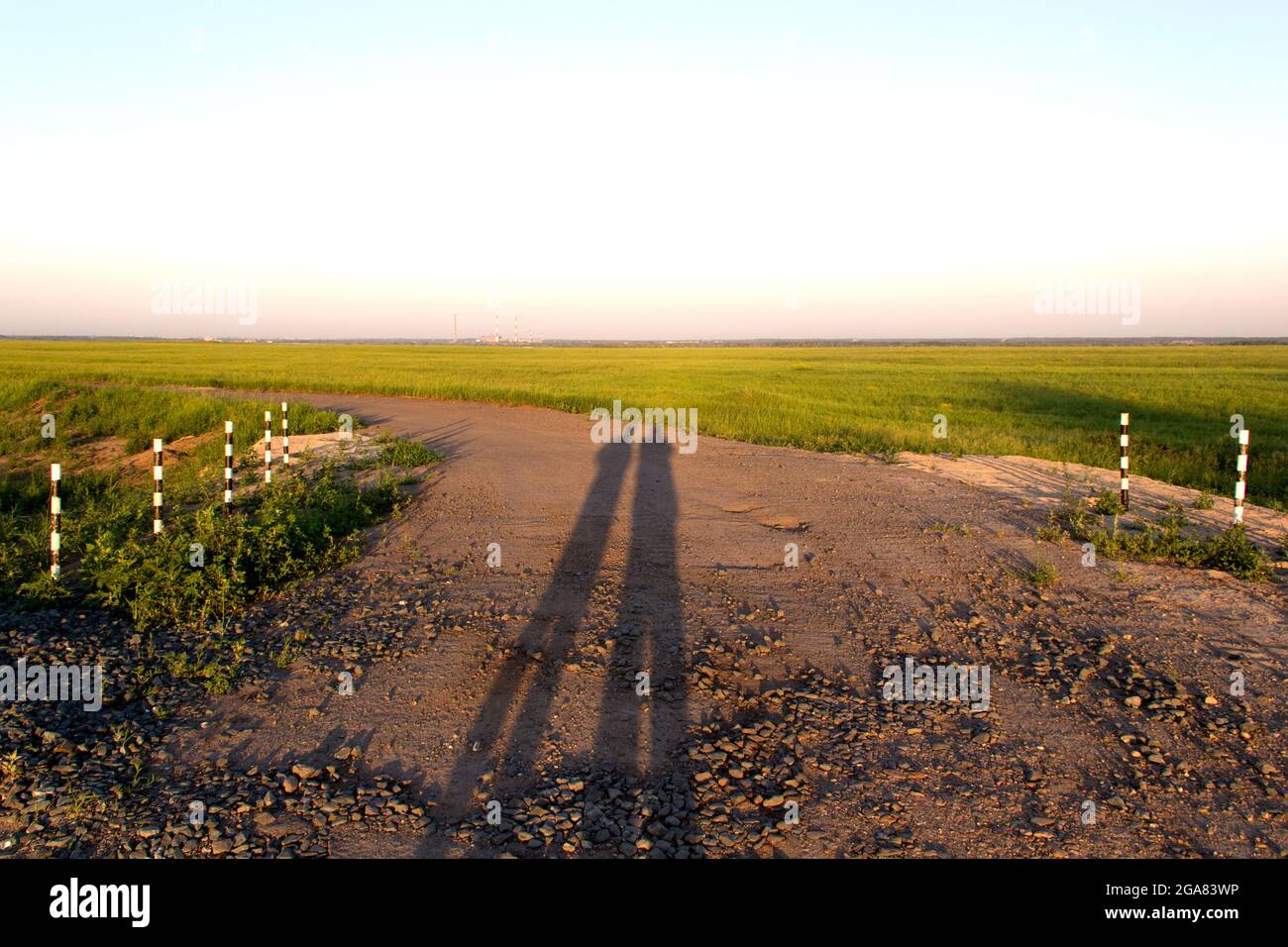 Long shadows on a road hi-res stock photography and images - Alamy