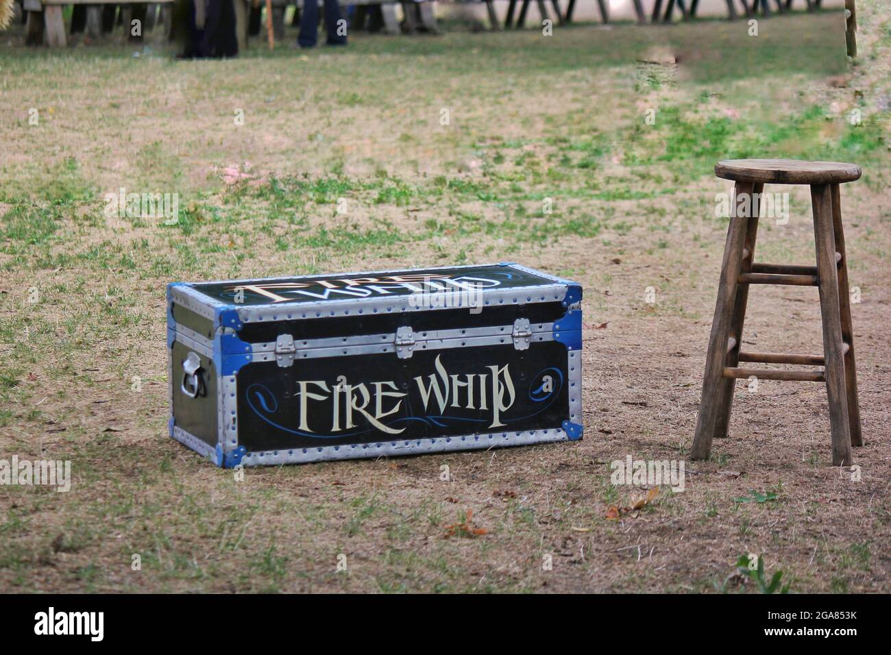 A huge black chest with Fire Whip painted on its side as a ...