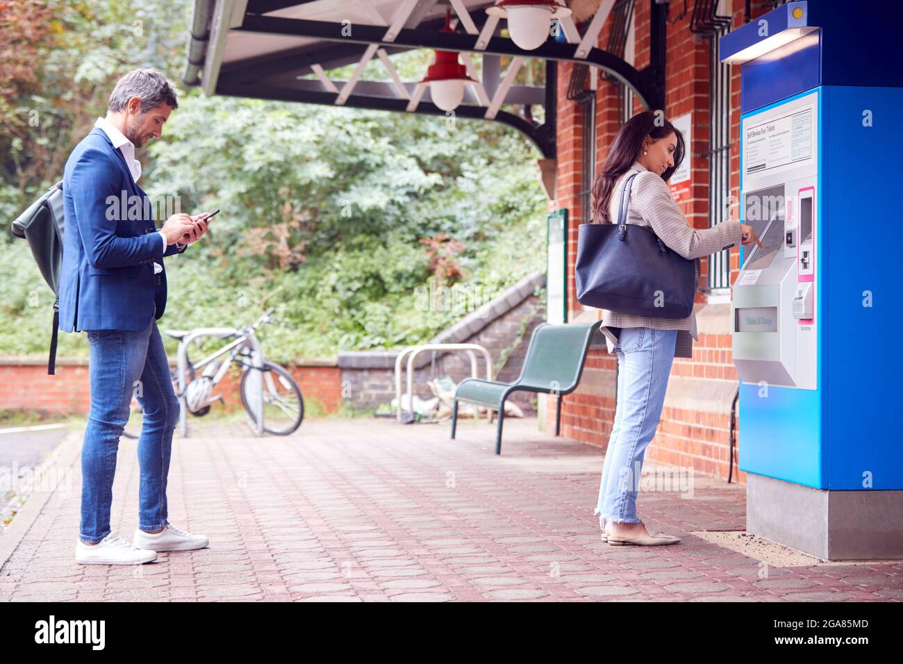 Waiting ticket machine hi-res stock photography and images - Alamy
