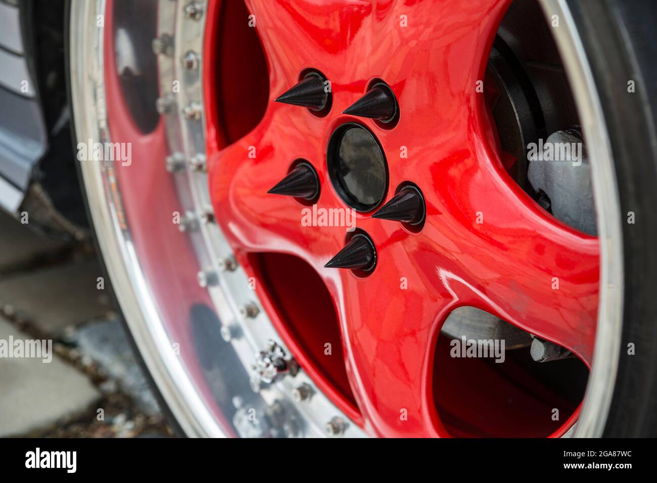 Modern car wheel with a light alloy disc. Low chassis Stock Photo - Alamy