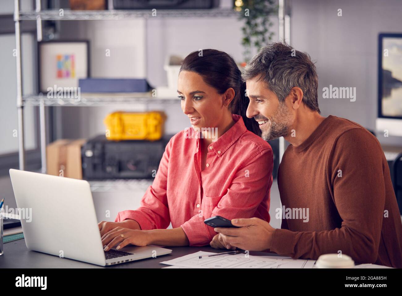 Male And Female Advertising Marketing Or Design Creatives Collaborating ...