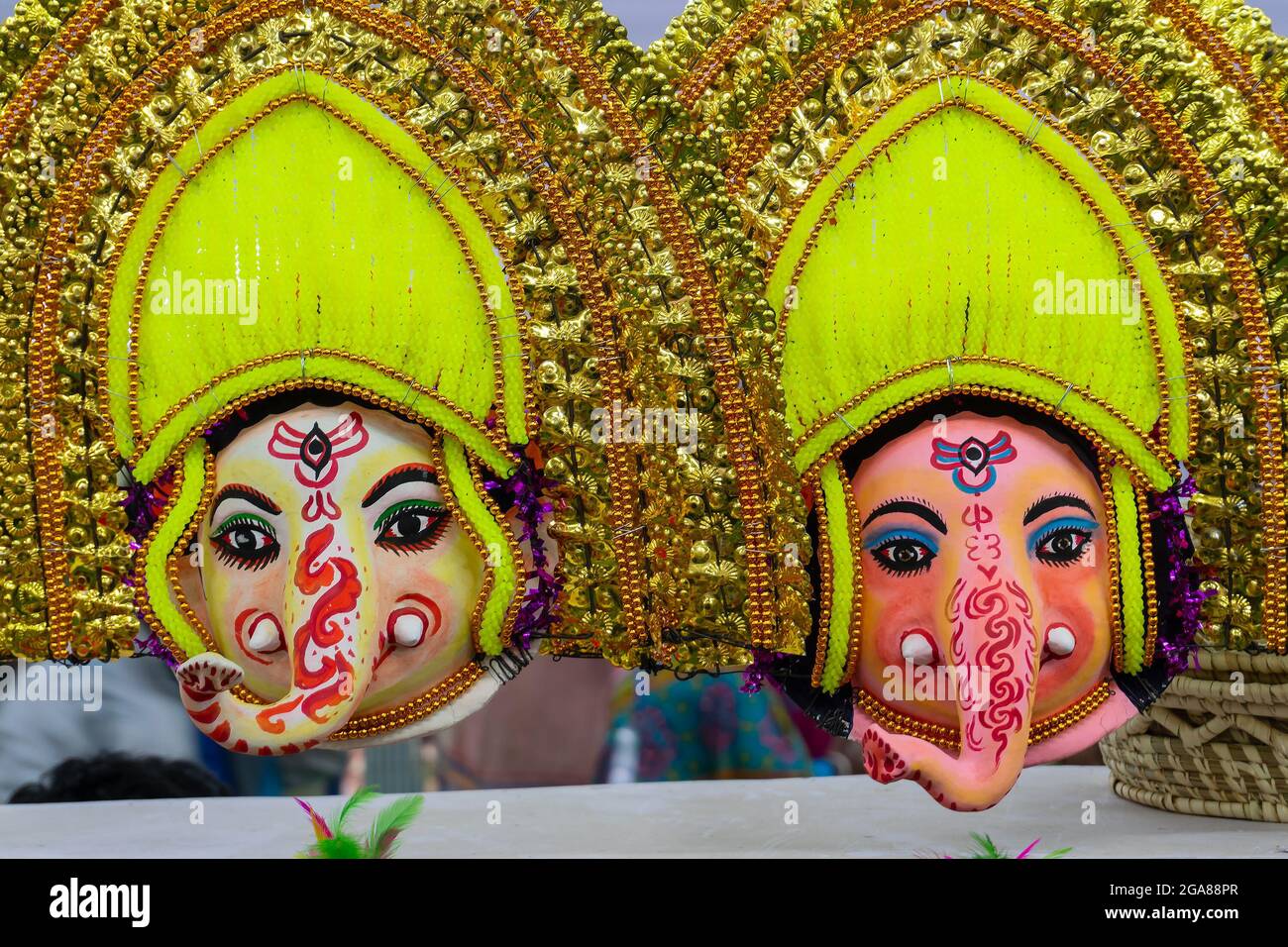 Colorful chhou masks of Lord Ganesha, Indian Hindu God, on display for ...