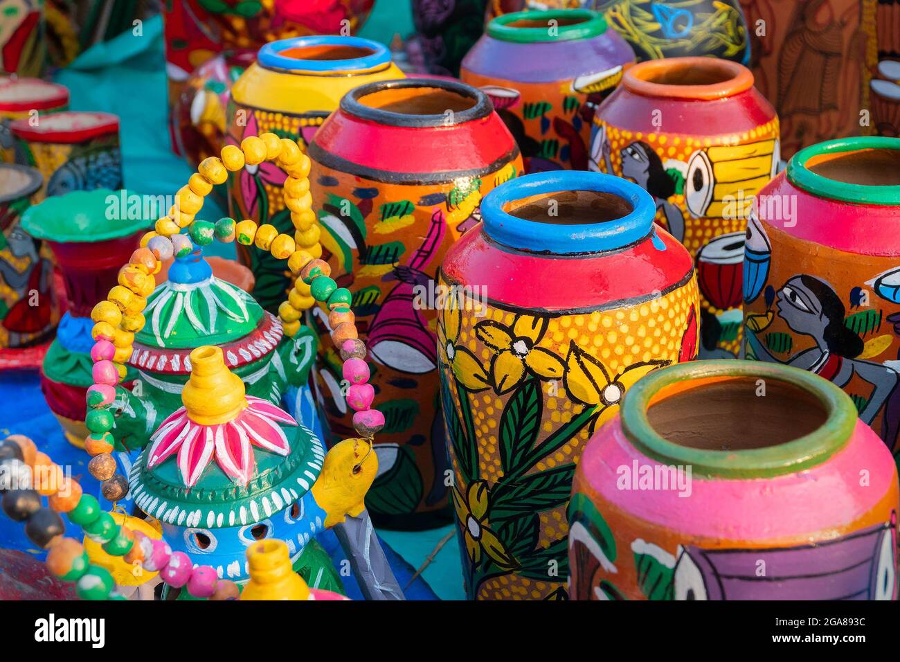 Beautiful painted colorful terracotta pots, works of handicraft, for ...