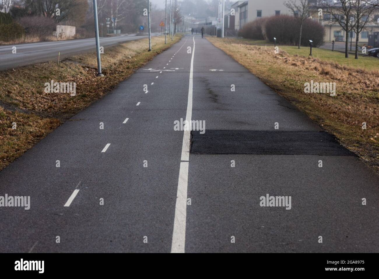 Combined two lane bicycle road and sidewalk Stock Photo - Alamy