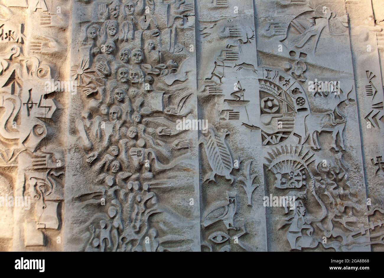 Old public library building facade detail with decorative illustration ...