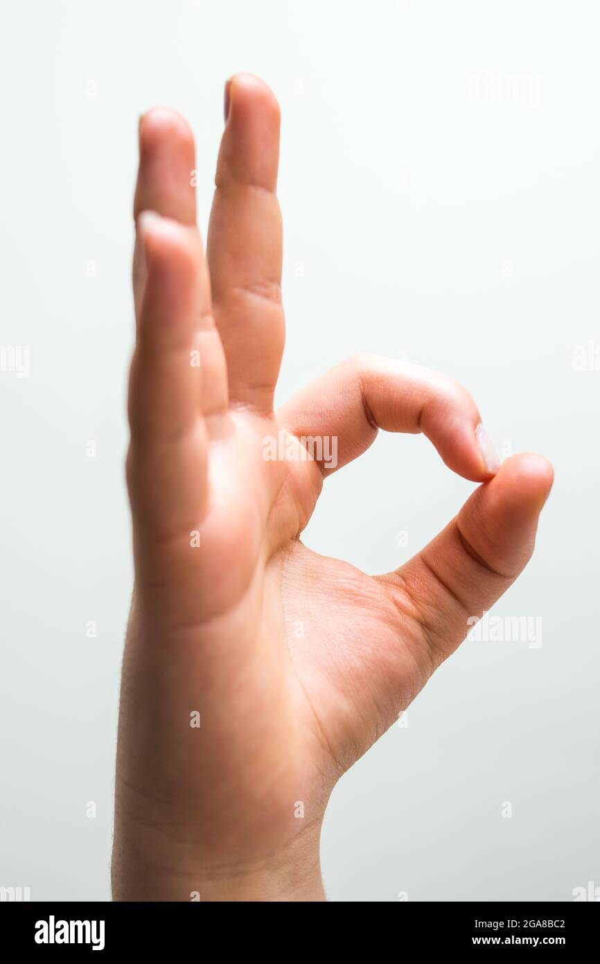 Hand linking the fingers, making a symbol of success Stock Photo - Alamy
