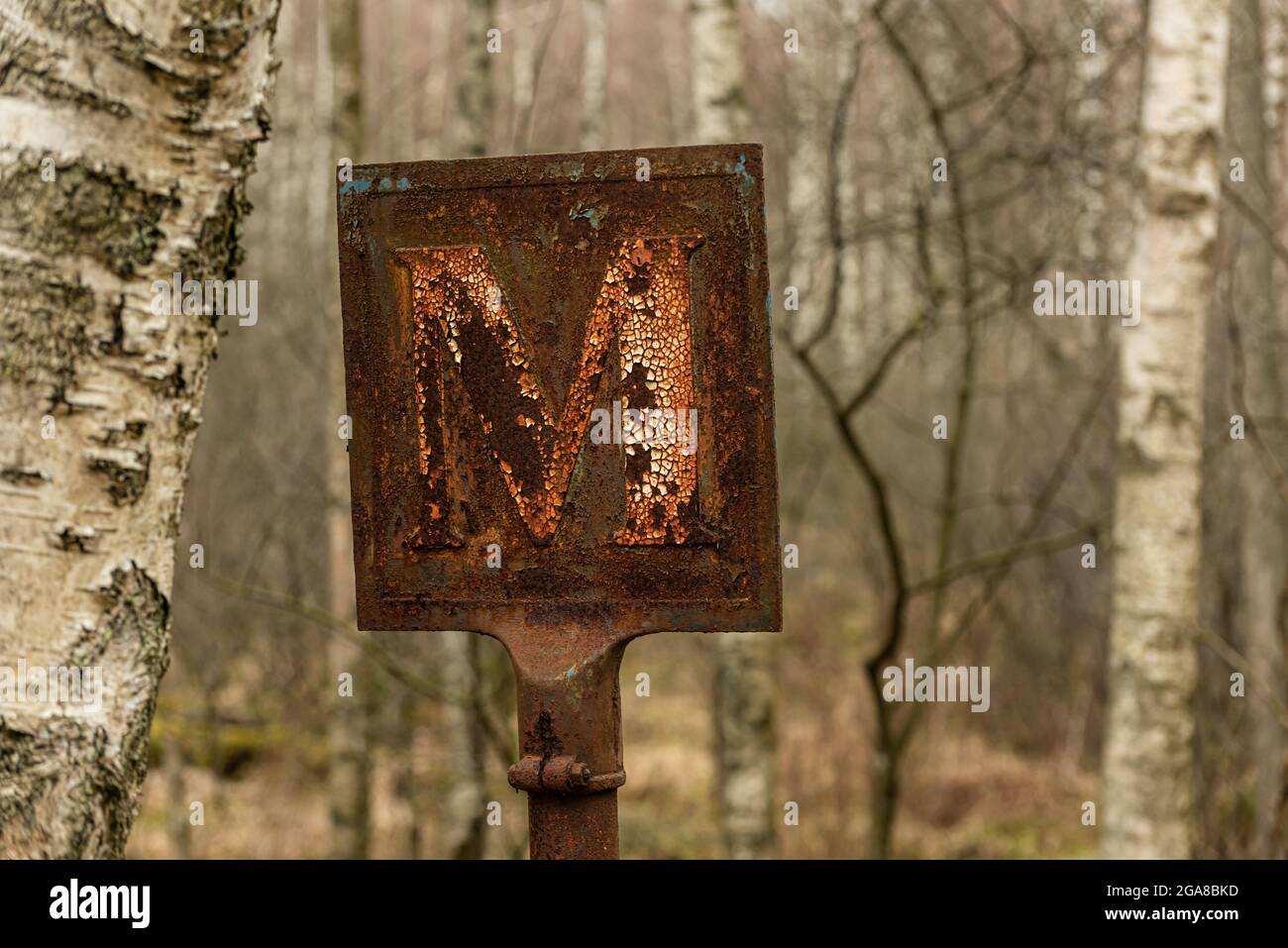 Old and rusty meeting point road sign Stock Photo - Alamy