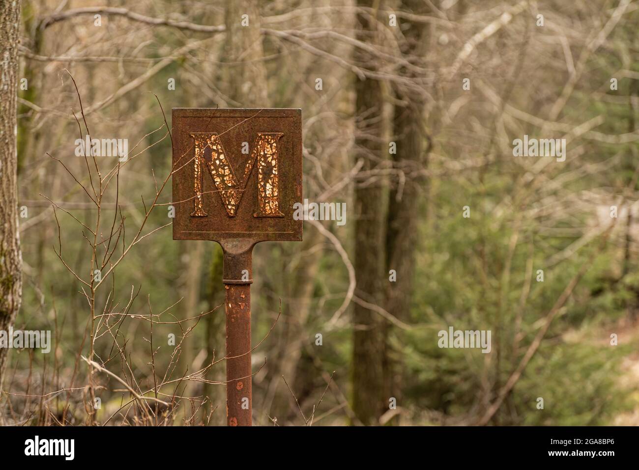 Old and rusty meeting point road sign Stock Photo - Alamy
