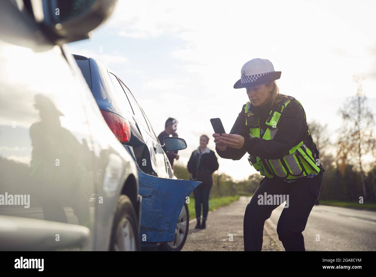 Female Traffic Police Officer Taking Photos On Mobile Phone At Road ...