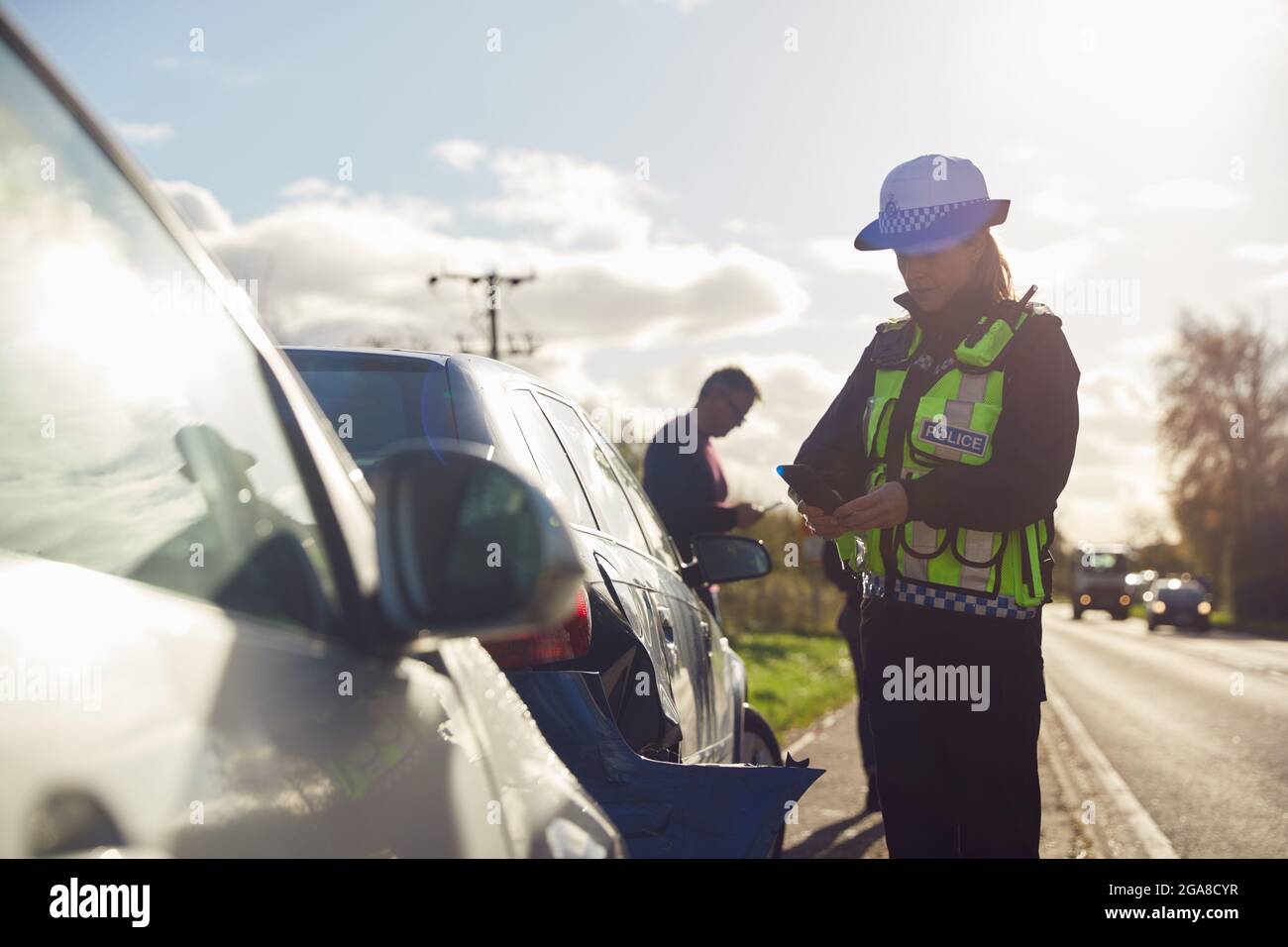 Female Traffic Police Officer Taking Photos On Mobile Phone At Road ...