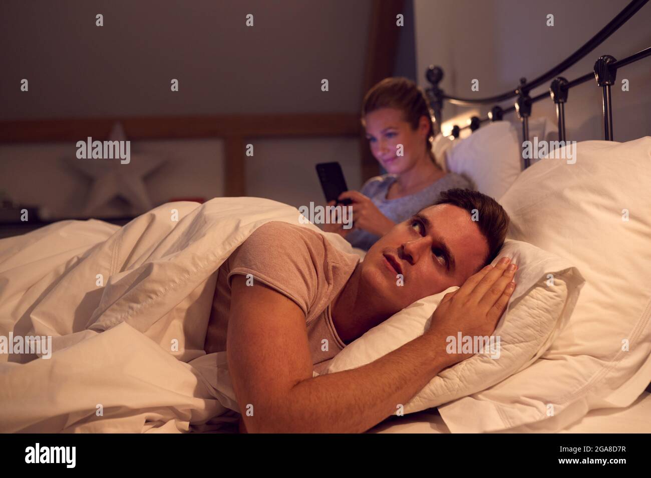 Man suspicion mobile phone hi-res stock photography and images - Alamy