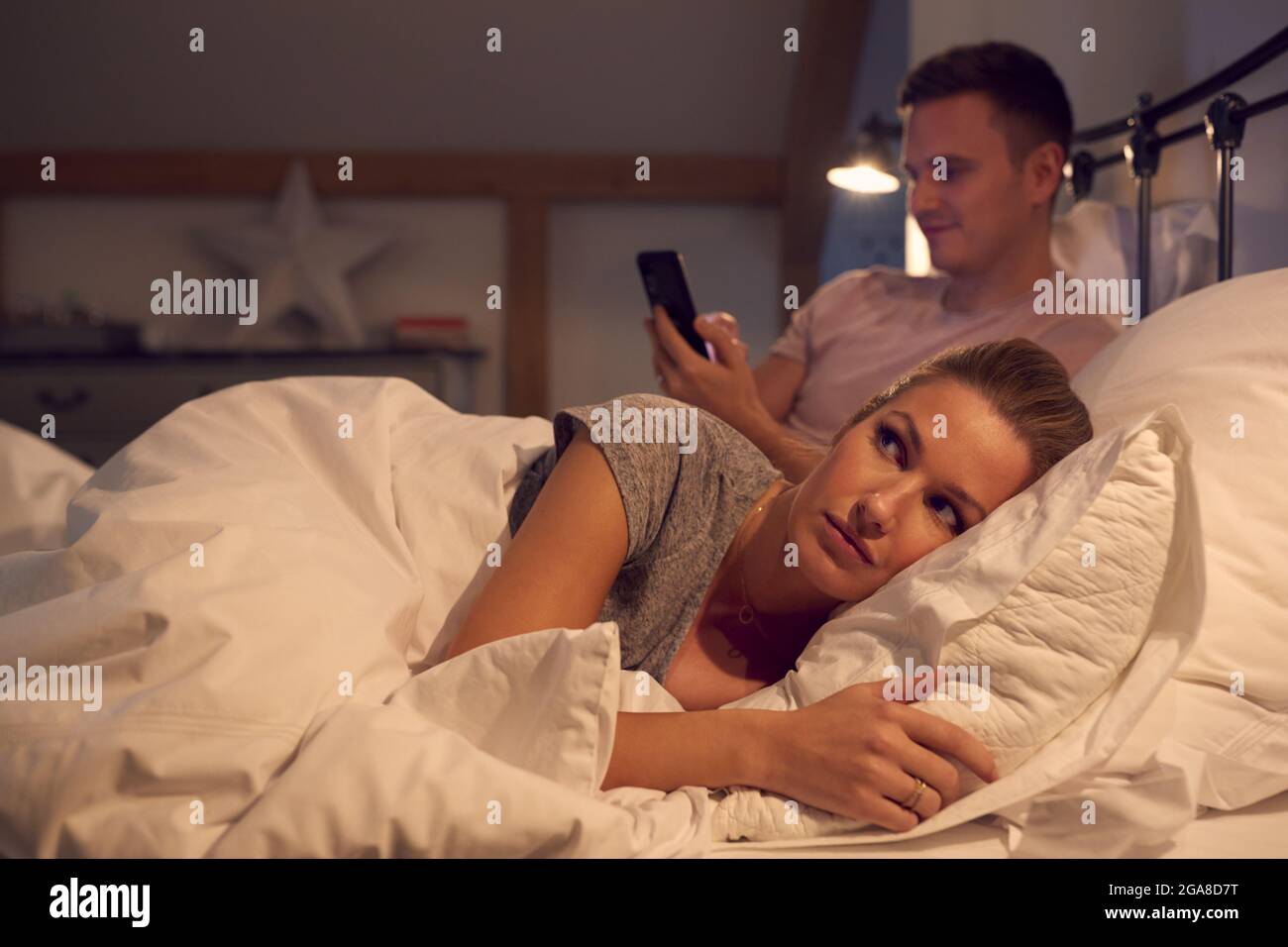 Man suspicion mobile phone hi-res stock photography and images - Alamy