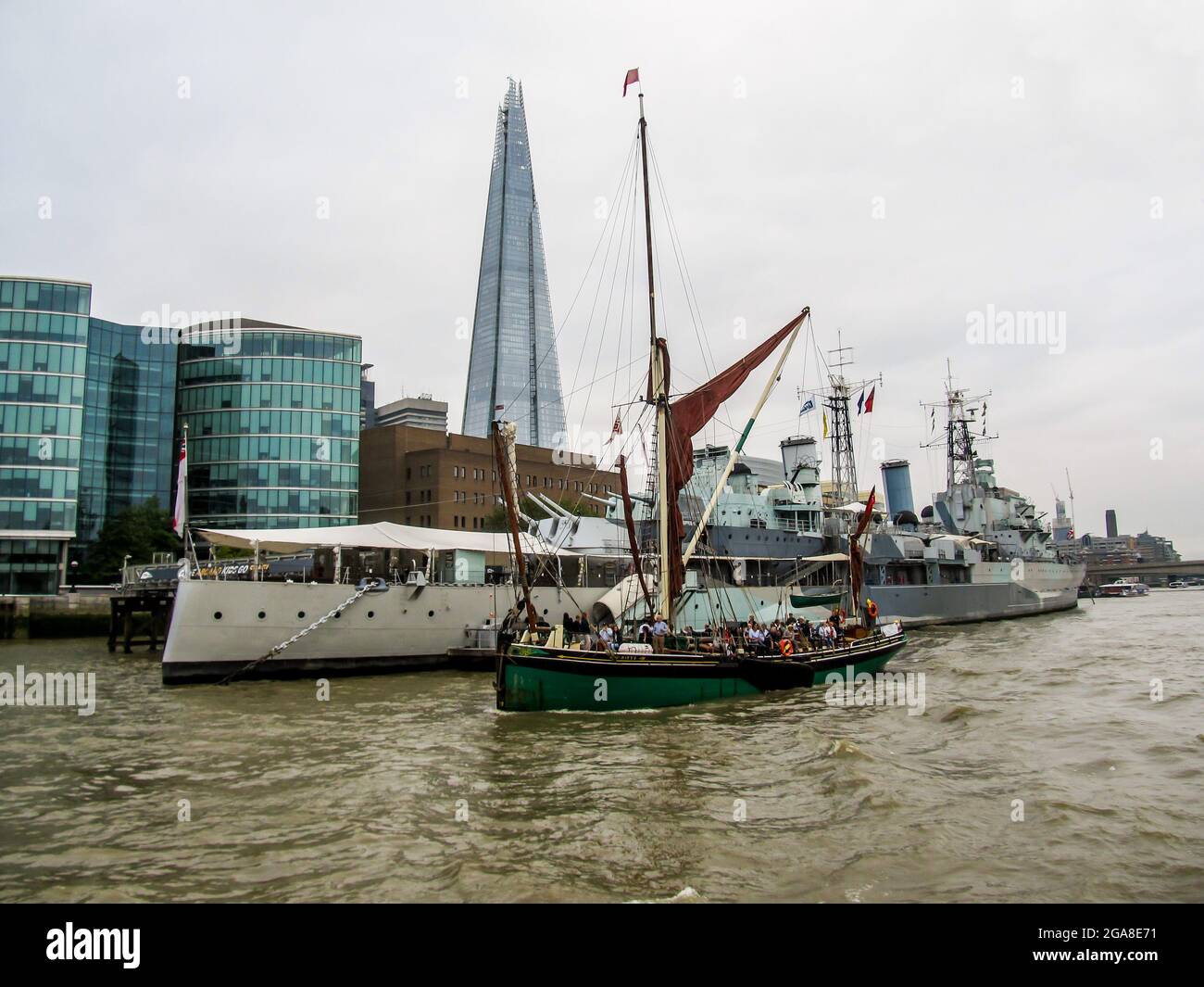 A single mast sail ship, part of the tall ship festival, sailing down ...
