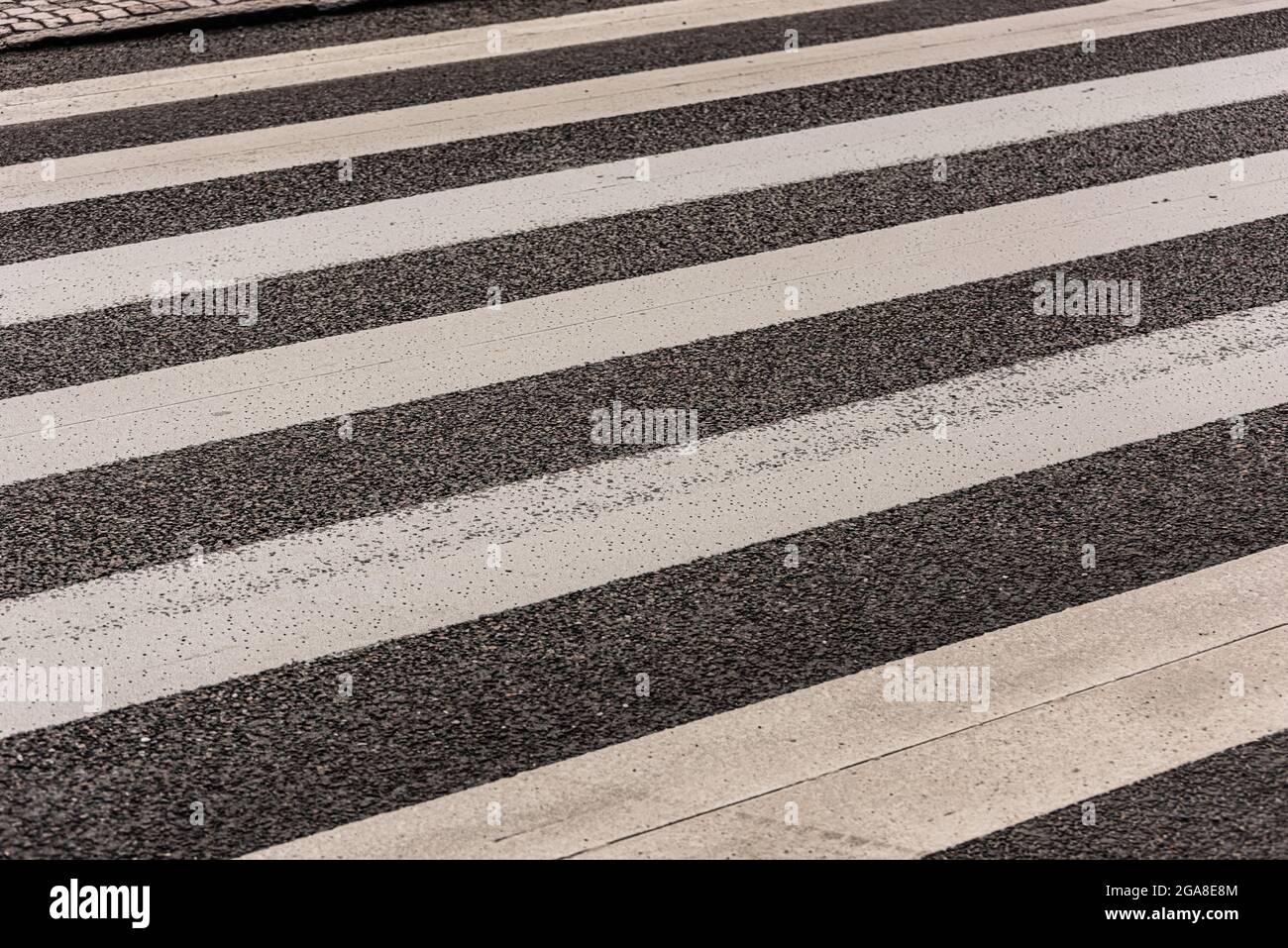 Zebra crossing stripes on a road Stock Photo - Alamy