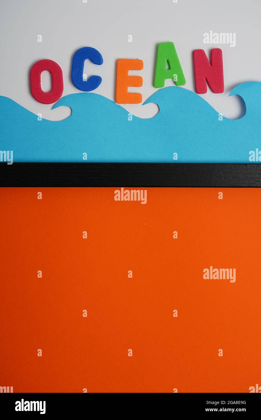 Letters OCEANS on a whiteboard with a copyspace with a summer vibe on ...