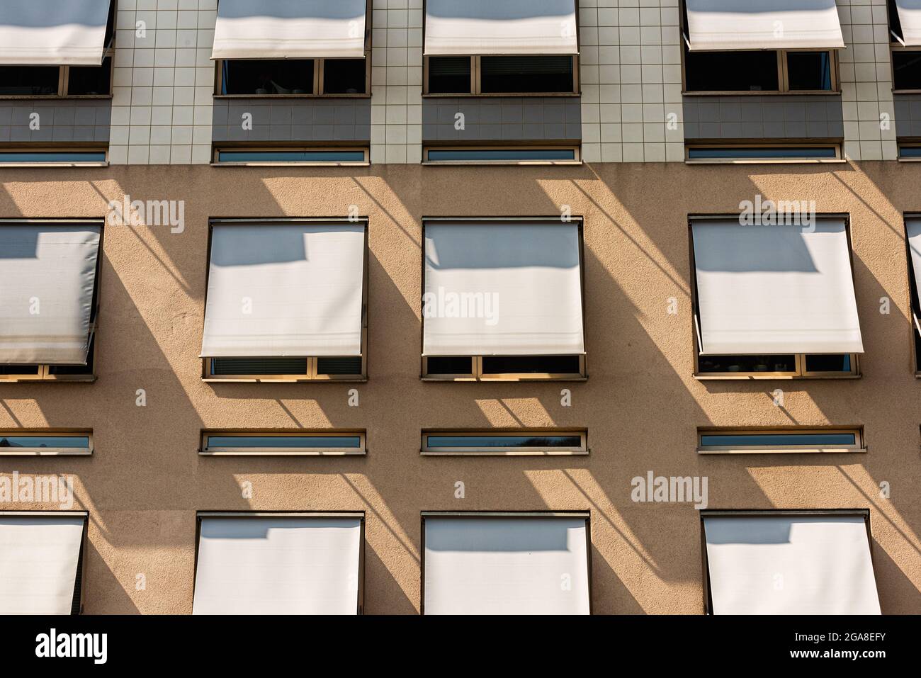 Sun shade on windows of an office building Stock Photo - Alamy