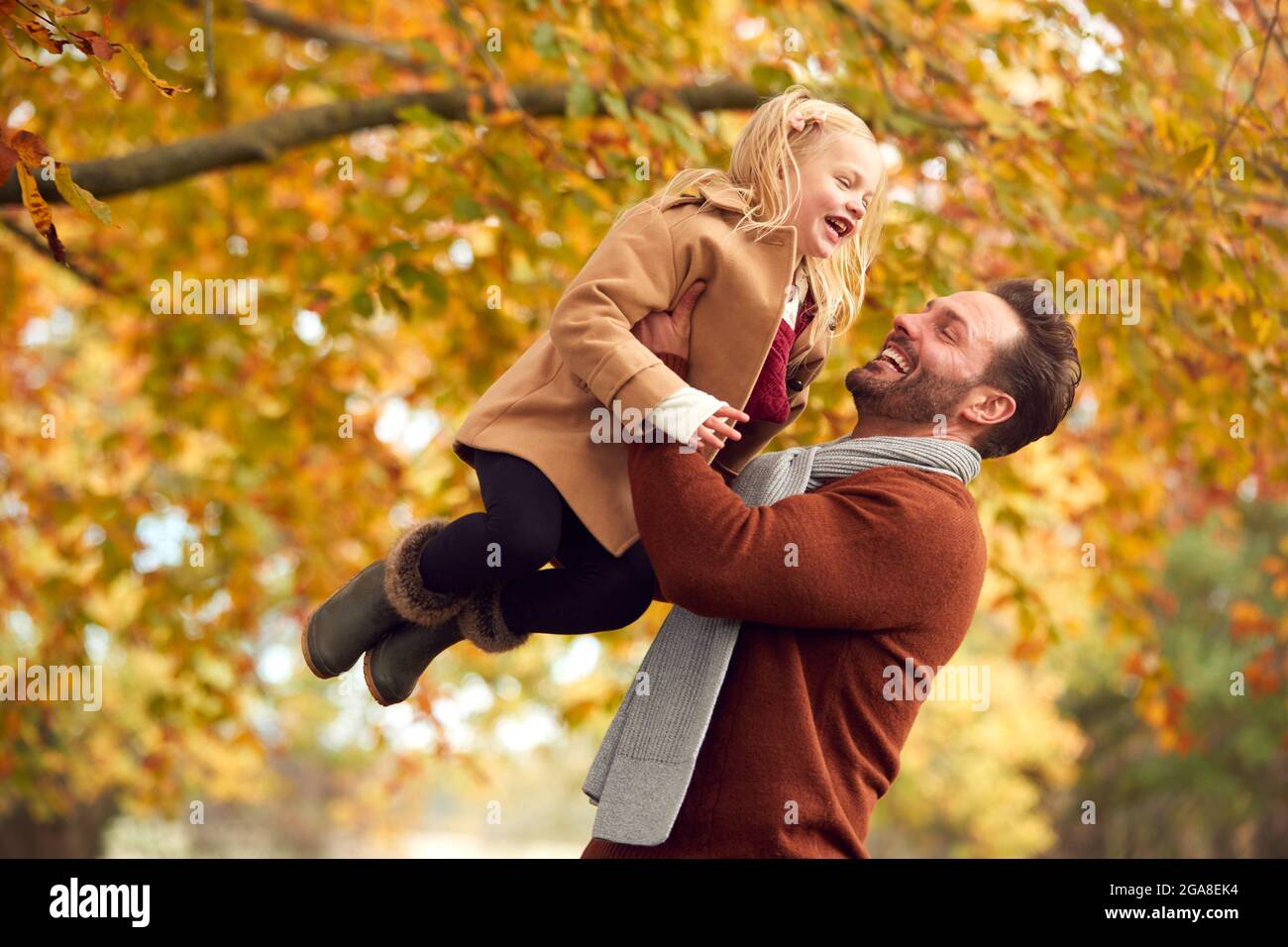 Father lifting up daughter on hi-res stock photography and images - Alamy