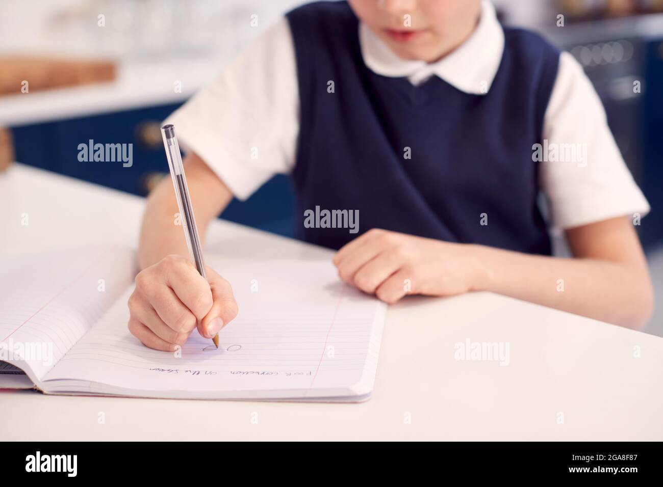 Primary child homework kitchen hi-res stock photography and images - Alamy