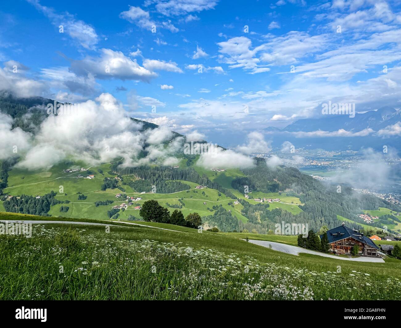 Summer view over the mountains in Tyrol Stock Photo - Alamy