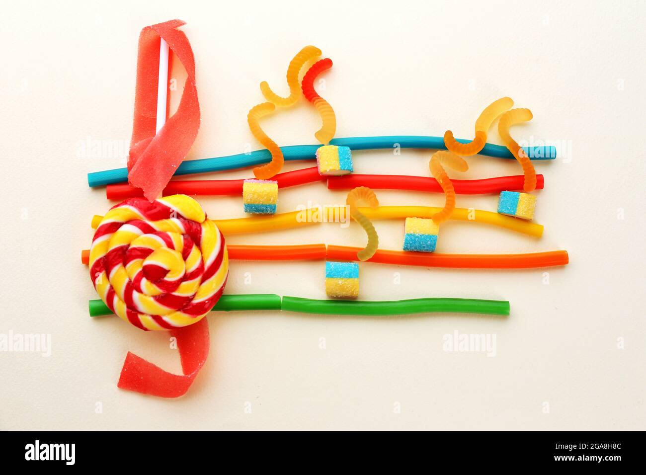 Treble clef and musical notes of candies isolated on white Stock Photo ...