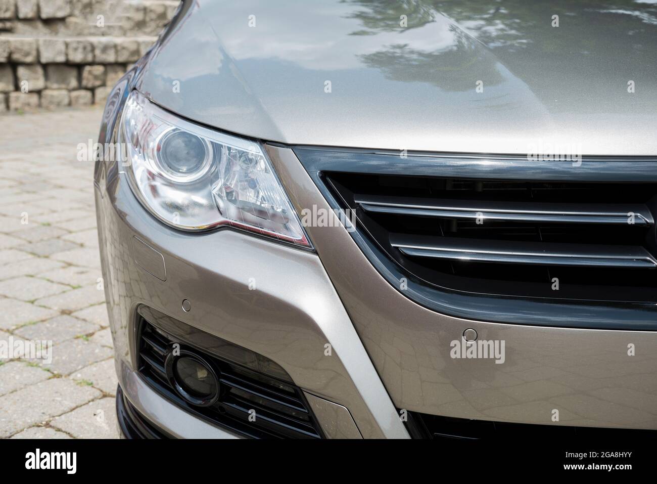Car front light and the bumper Stock Photo - Alamy