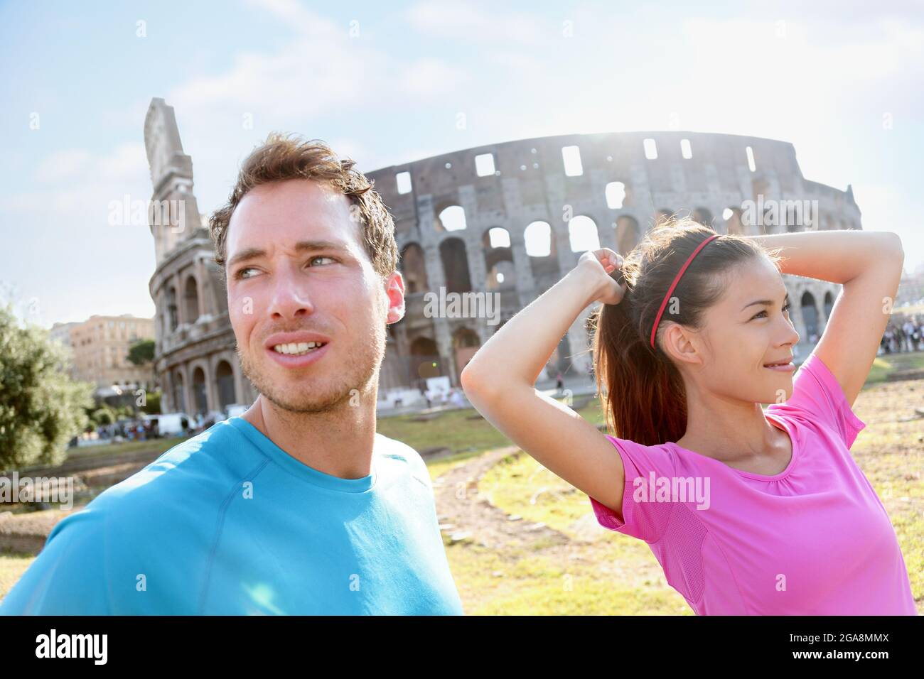 People Running by Colosseum in Rome Stock Photo - Alamy