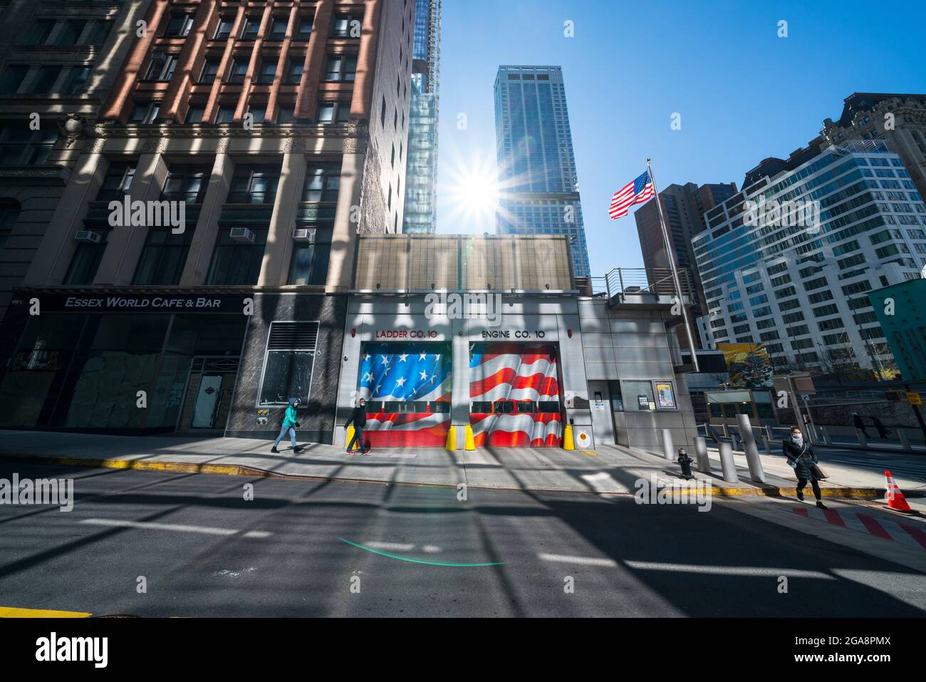 The sun shines from behind over the Lower Manhattan skyscraper on March ...