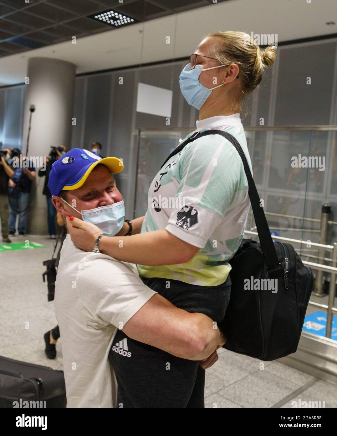 29 July 2021, Hessen, Frankfurt/Main: Sabine Kusterer is lifted up by ...