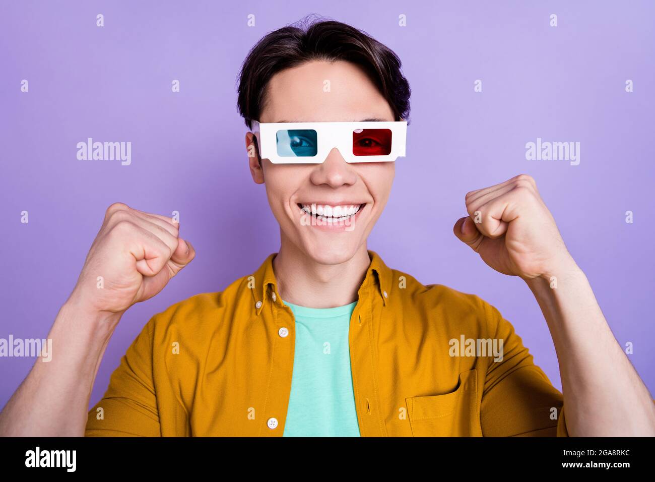 Photo of cool brunet young guy hands fists wear spectacles yellow shirt ...