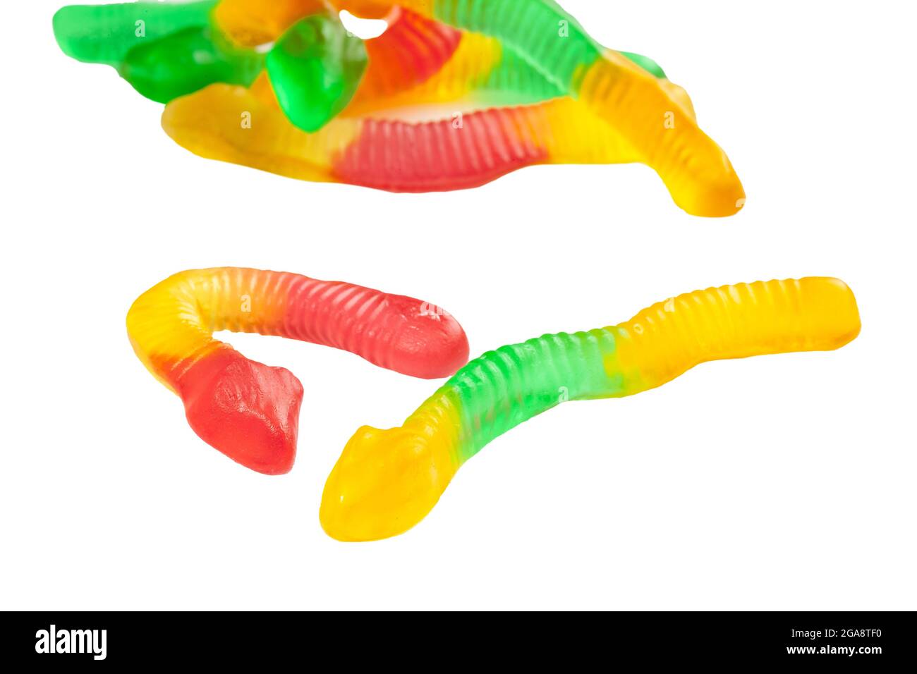 Colorful gummy worms isolated on white background Stock Photo - Alamy