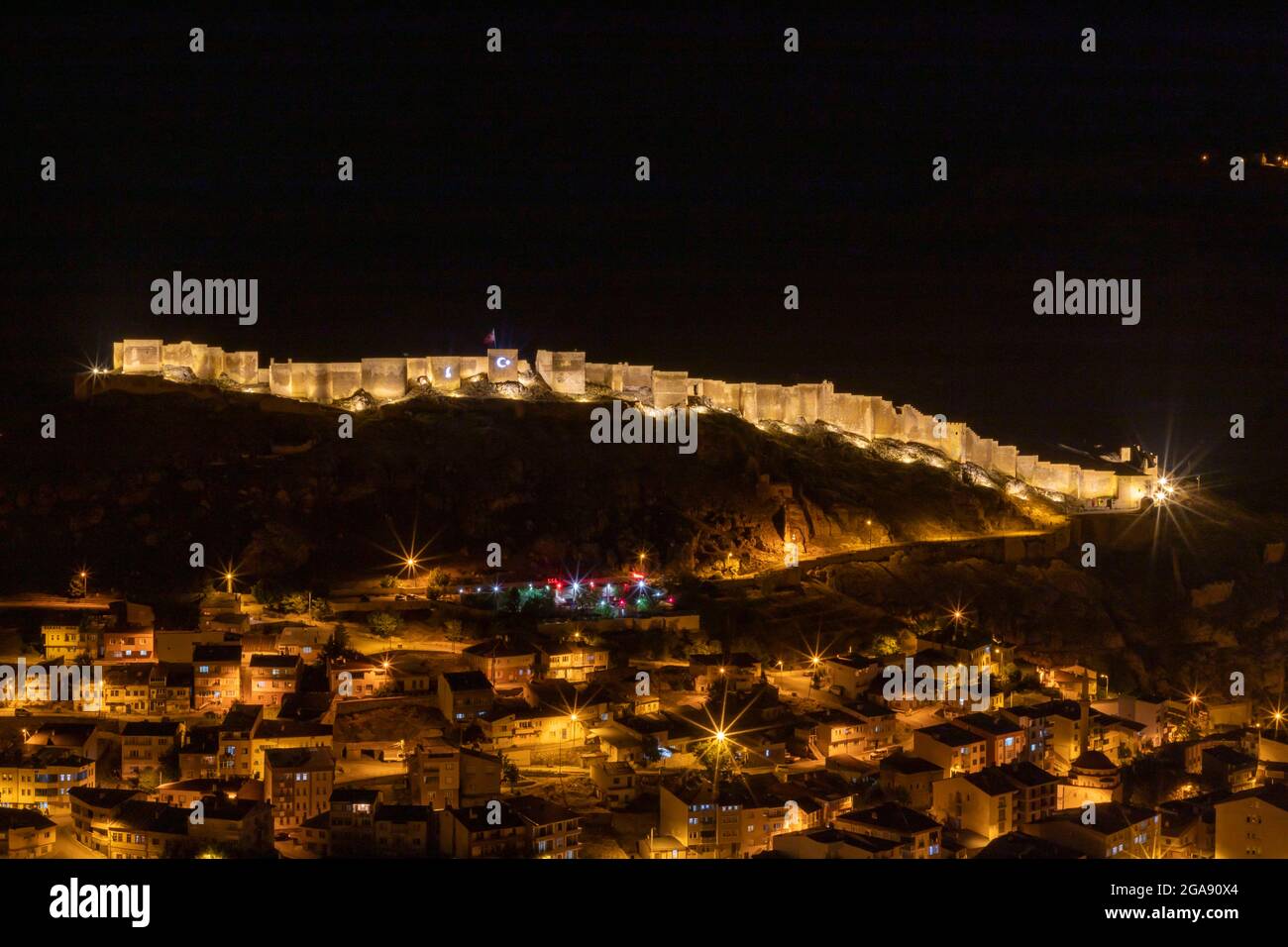 Illuminated historical Bayburt castle in night view Stock Photo - Alamy