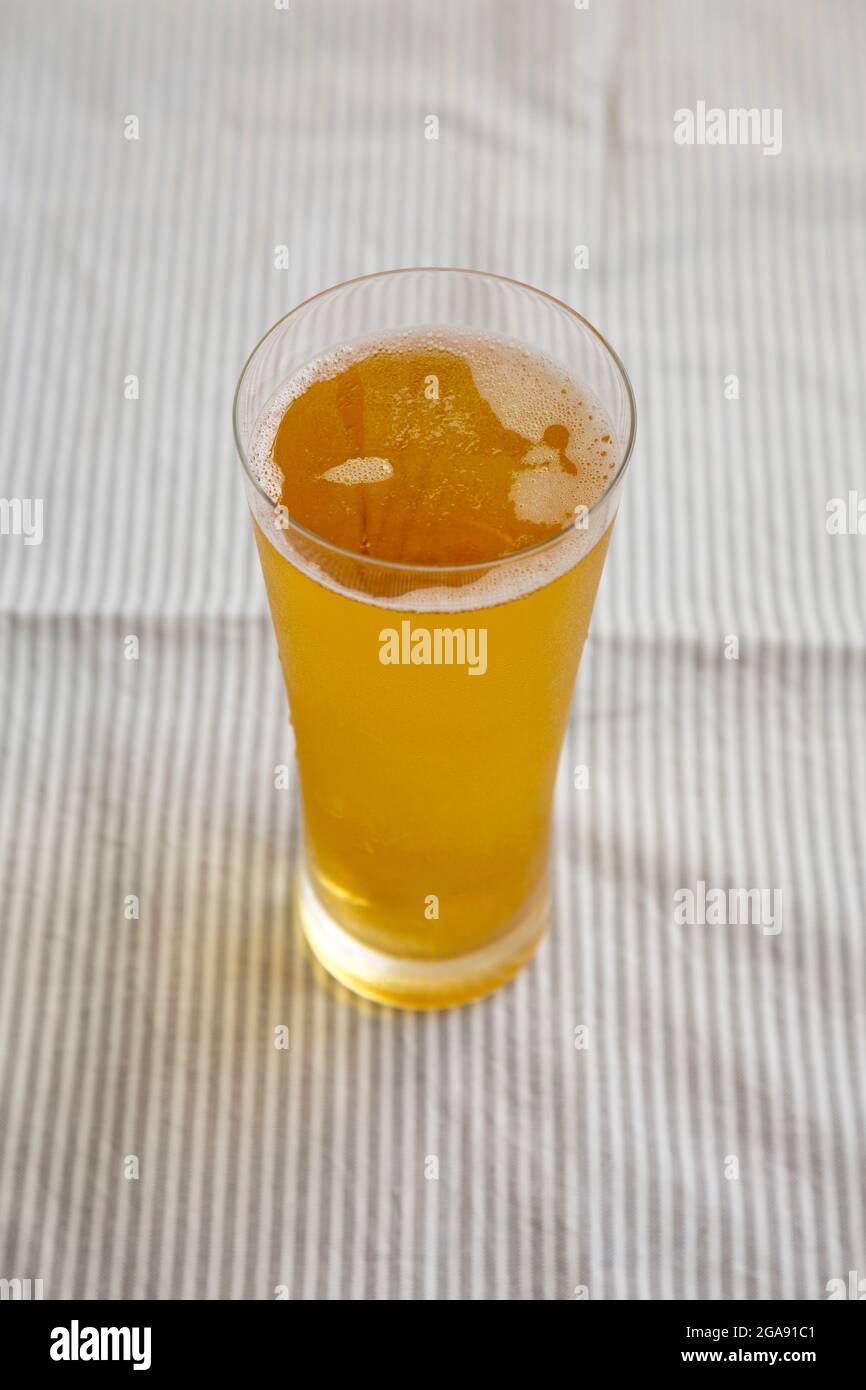 Cold Beer in a Glass, side view Stock Photo - Alamy
