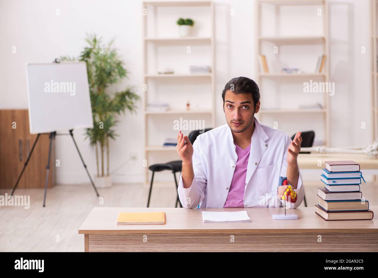 Young doctor student cardiologist sitting in the classroom Stock Photo ...