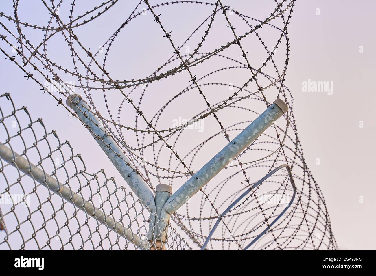 Prison security fence. Security measures for prisoners Stock Photo - Alamy
