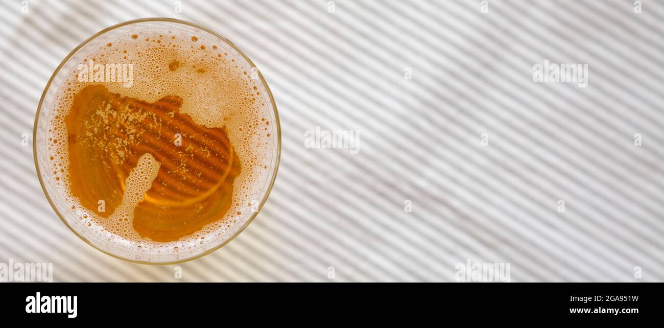 Cold Beer in a Glass, top view. Overhead, from above, flat lay. Space ...
