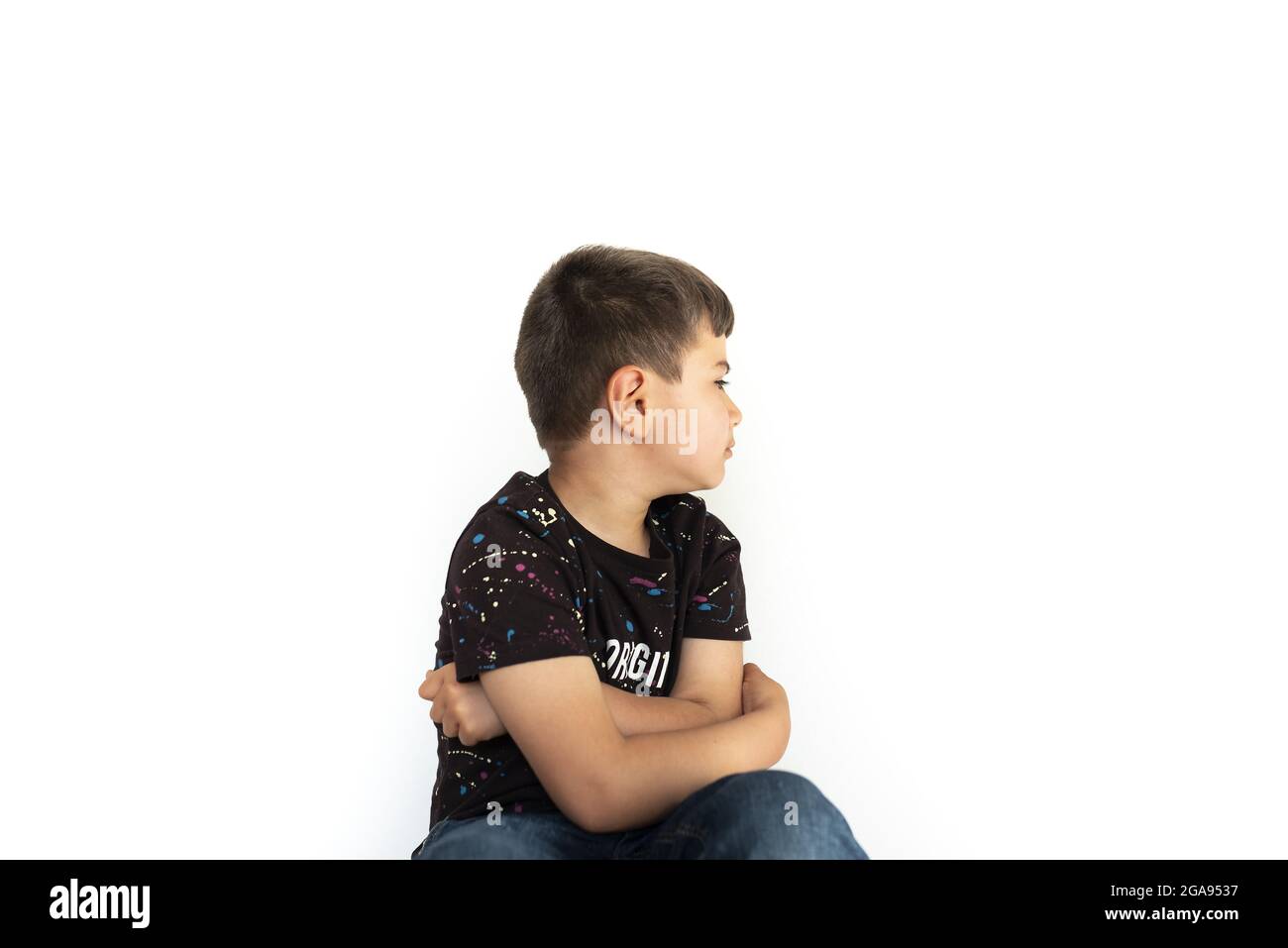 Caucasian children grimacing angrily against white background Stock ...