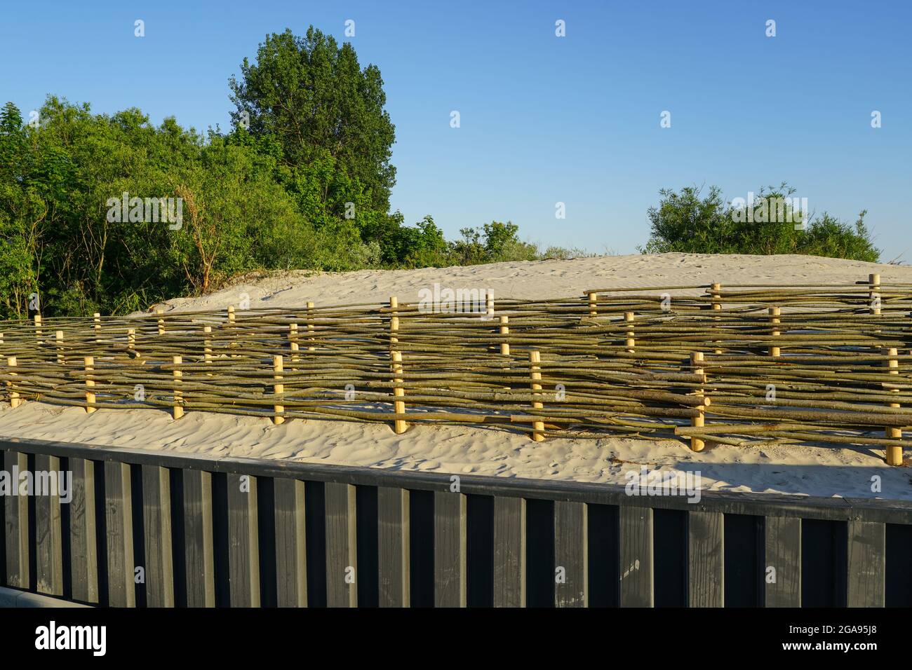 protection of beach infrastructure from sand dune movement with new ...