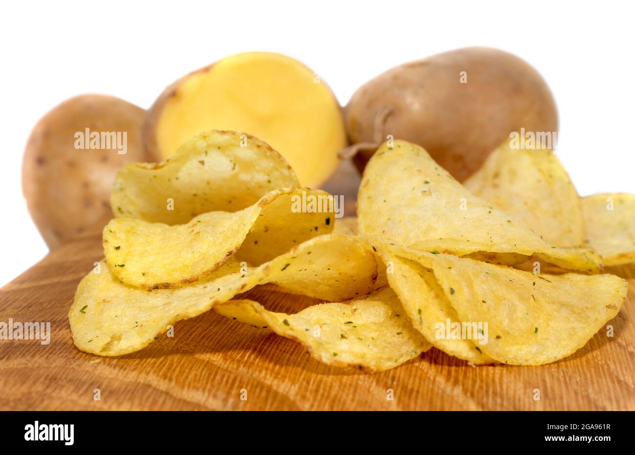 Potato Crisps with spices and potatoes on a white background Potato ...