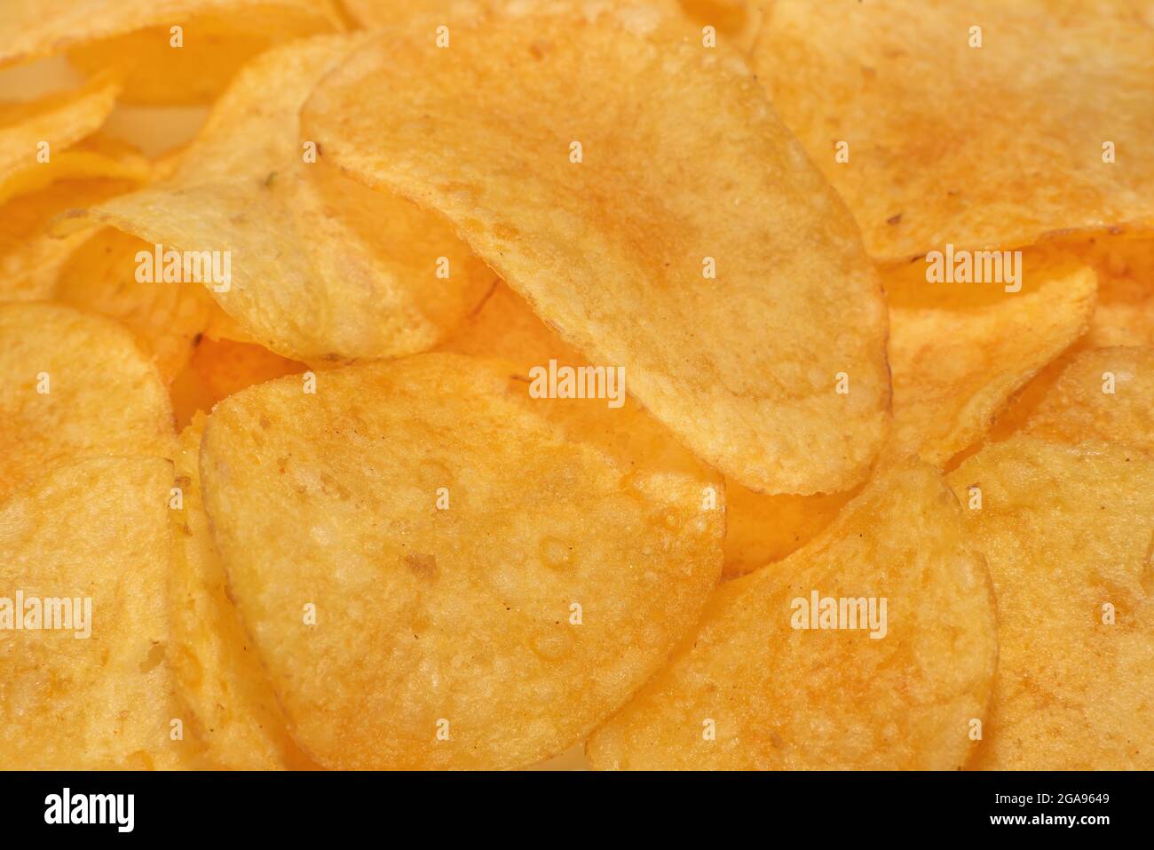 Crisps. Crisps with spices. Potato chips. Crisps close-up Stock Photo ...