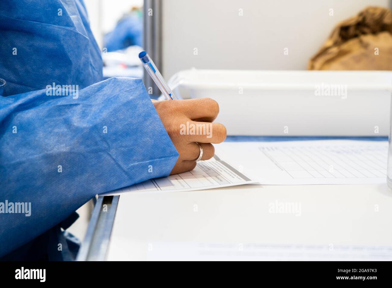 Hand writing medical care hi-res stock photography and images - Alamy