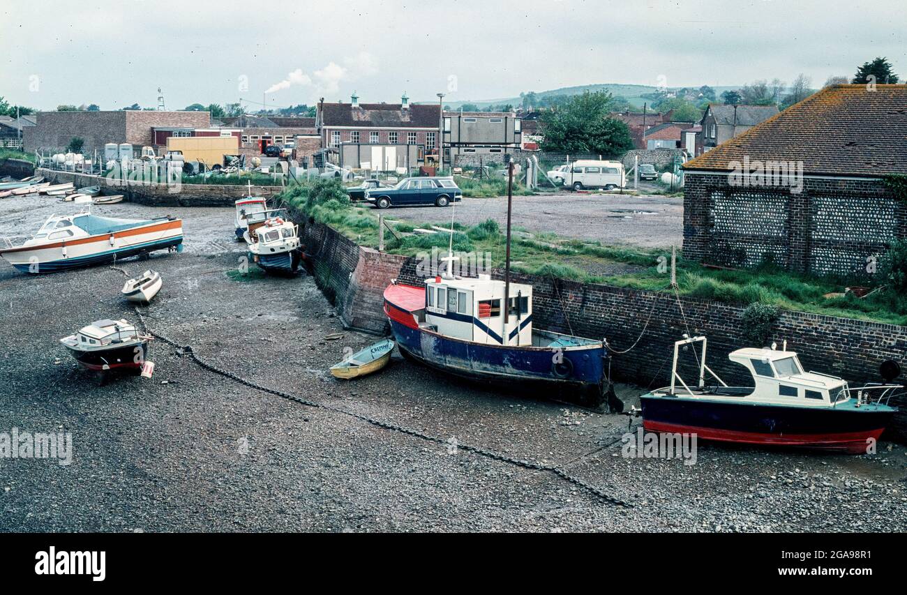 Boats along the harbour wall in Shoreham Harbour, 1976 Stock Photo - Alamy