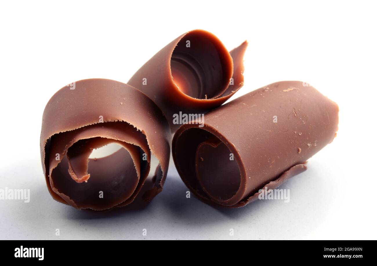Chocolate curls isolated on white Stock Photo - Alamy