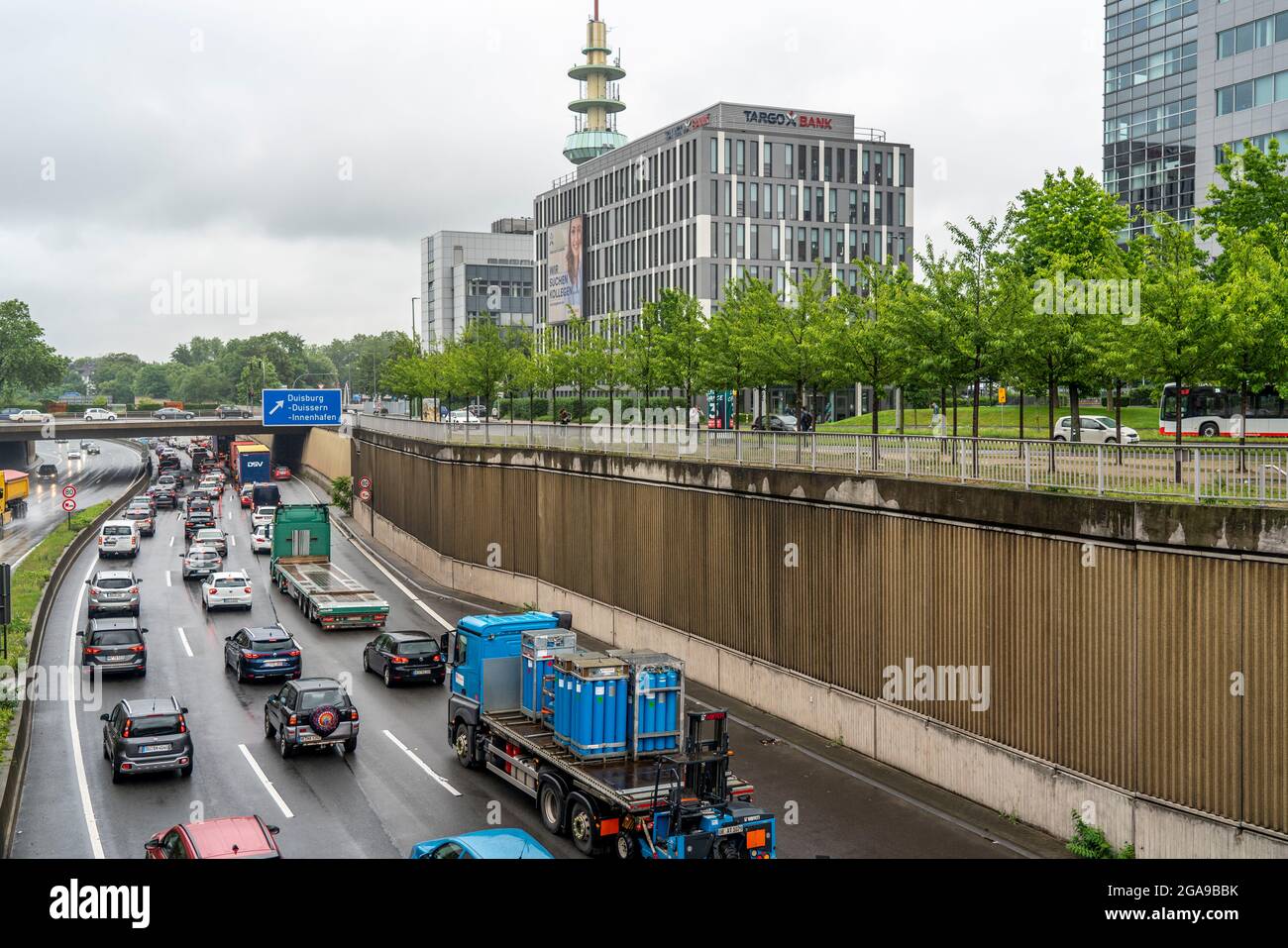 Traffic jam on the A59 freeway, passing through the city of Duisburg ...