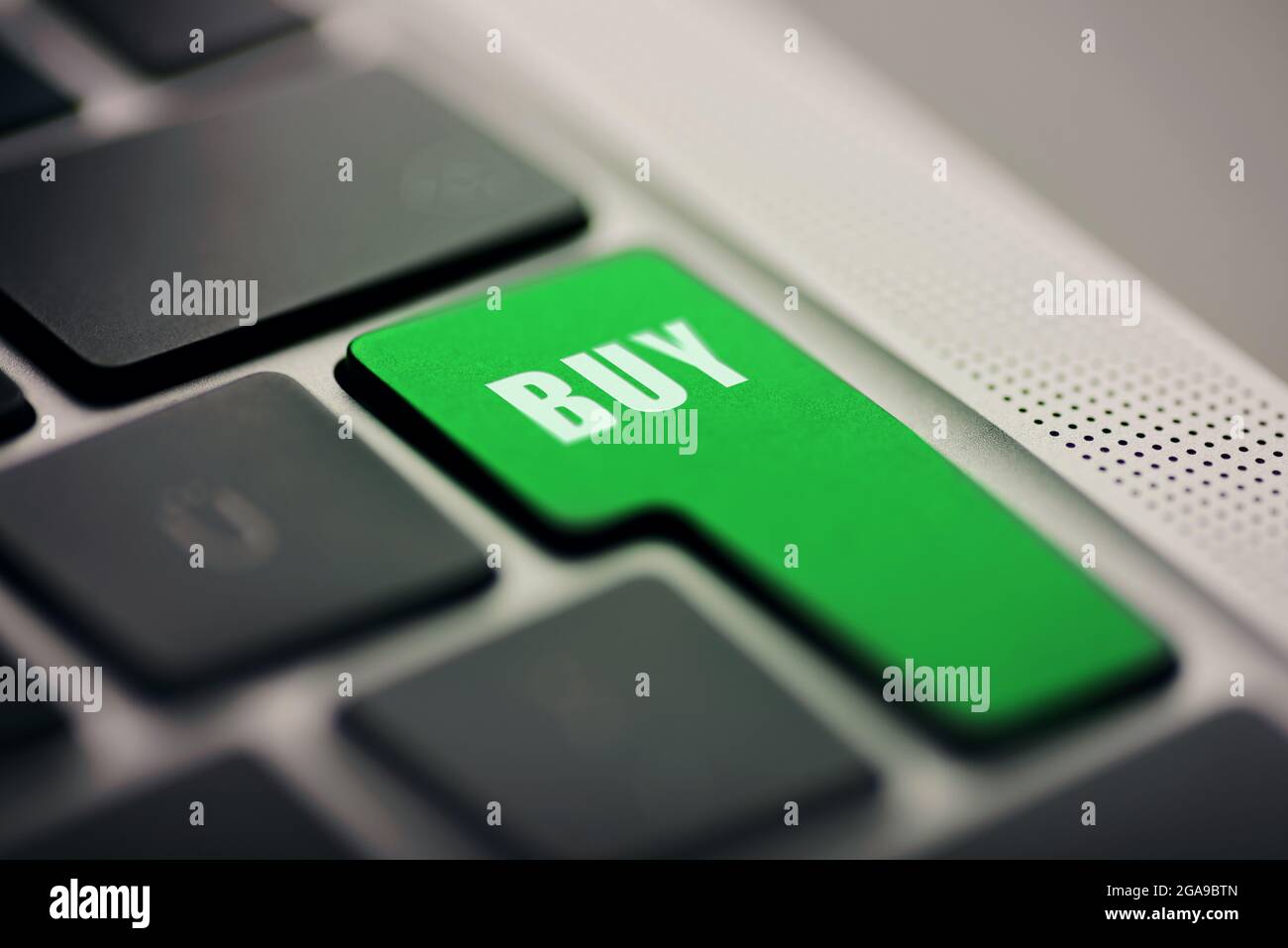 Close up shot of Enter button laptop computers enter button with Buy ...